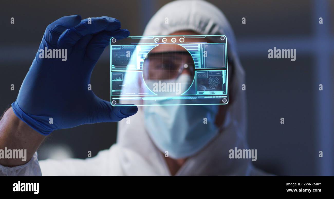 Image of purple virus cells over caucasian male lab worker in safety ...