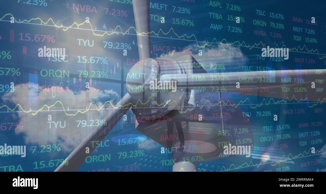 A wind turbine image and businessman symbolize stock market data ... A wind turbine image and businessman symbolize stock market data ...