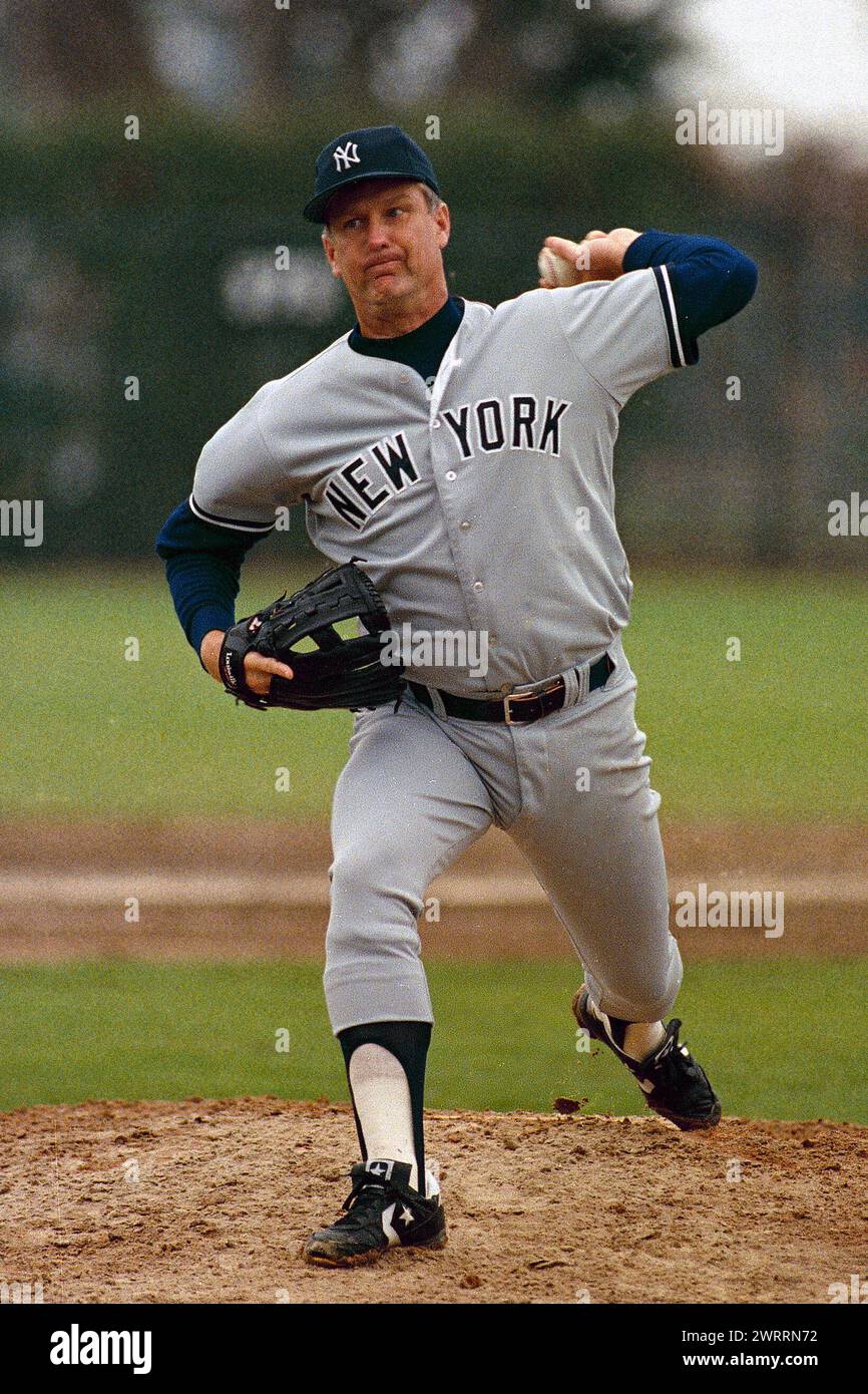 FILE - New York Yankees pitcher Tommy John, 45, throws against the ...