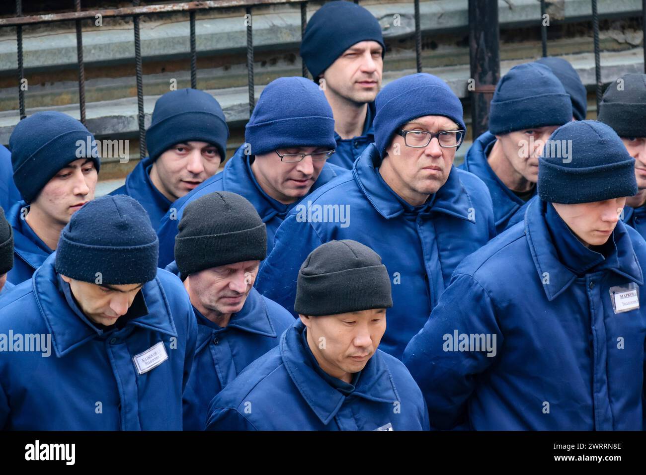 UKRAINE - MARCH 17, 2024 - Russian POWs in blue uniforms line up in ...