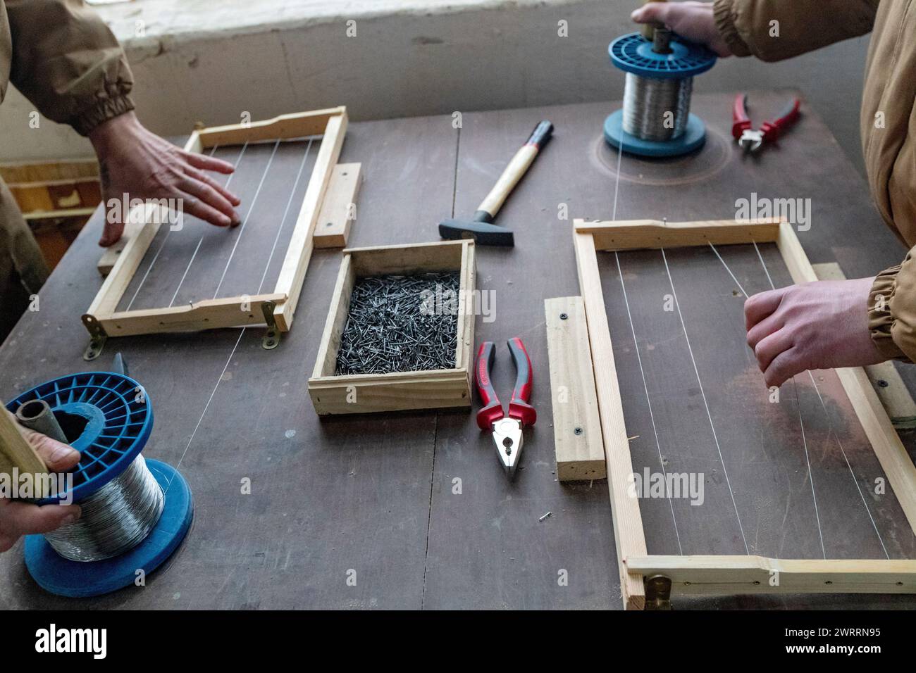 UKRAINE - MARCH 17, 2024 - Russian POWs make beehive frames at a ...