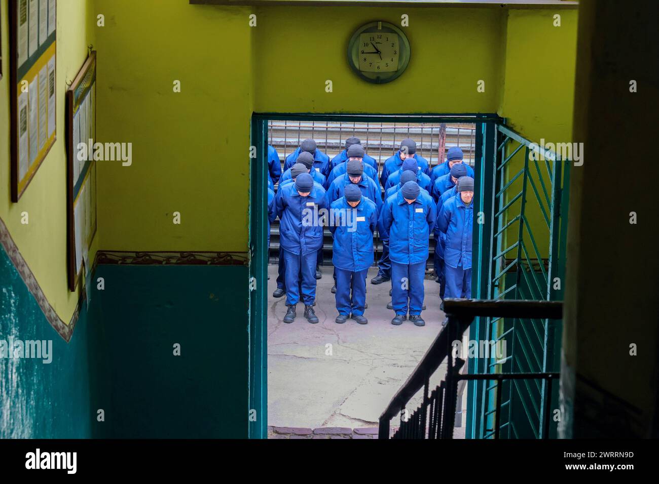 UKRAINE - MARCH 17, 2024 - Russian POWs in blue uniforms line up in ...