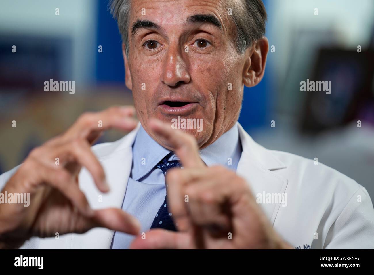 Dr. David Altchek talks to reporters in his office in New York ...