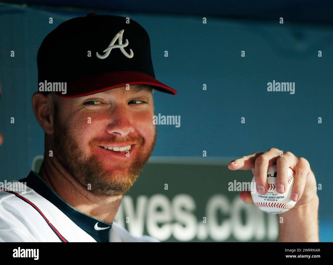 FILE - Atlanta Braves relief pitcher Jonny Venters sits on the bench ...