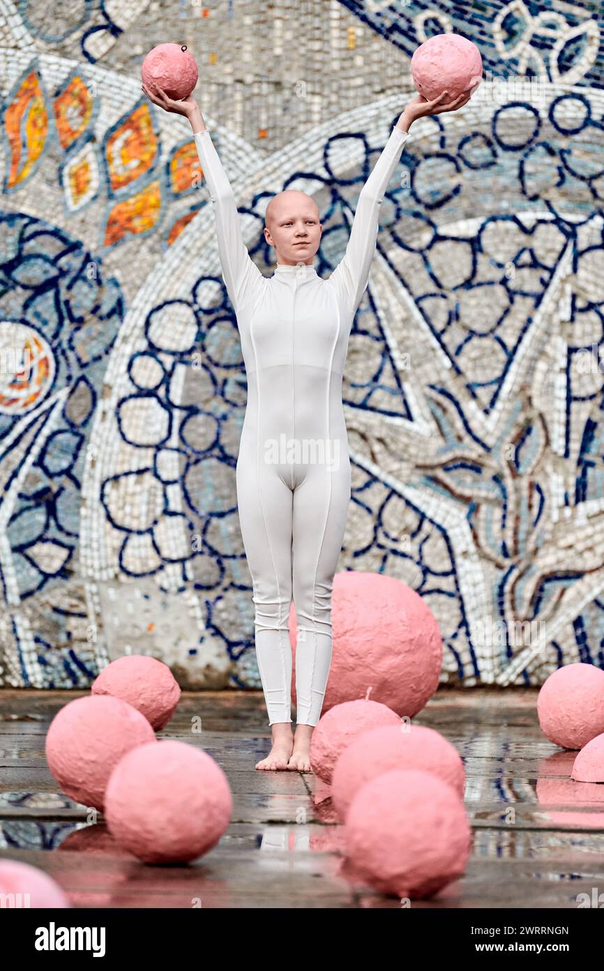 Outdoor dance of hairless girl ballerina with alopecia in white ...