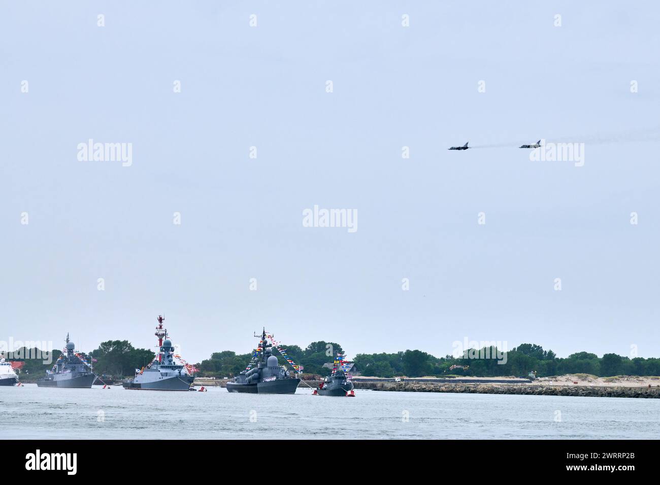 Military fighter jets are flying over Russian naval forces parade ...