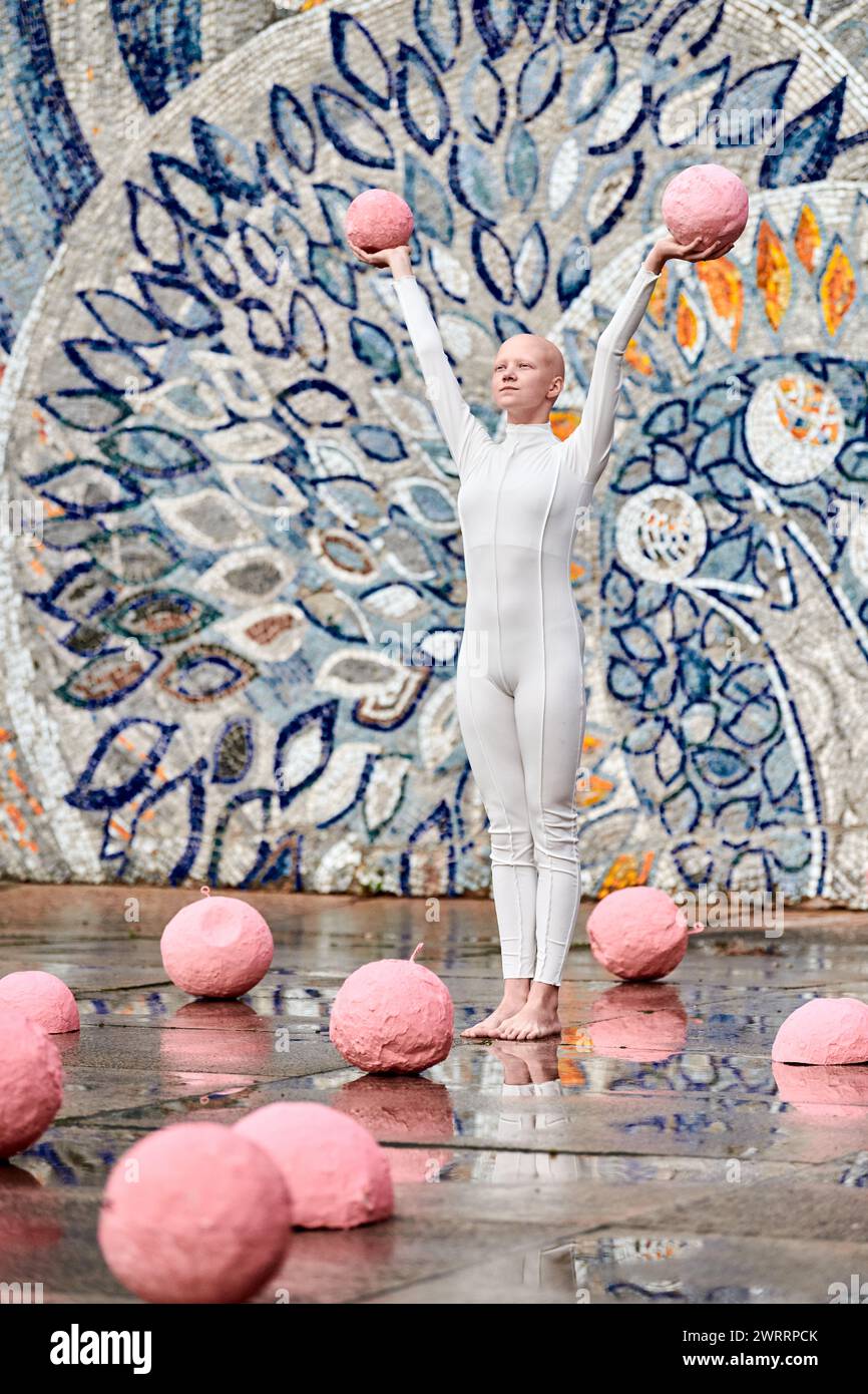 Outdoor dance of hairless girl ballerina with alopecia in white ...