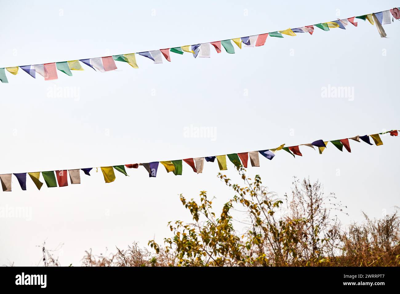 Colorful Tibetan prayer flags flutter ancient prayers into serene ...