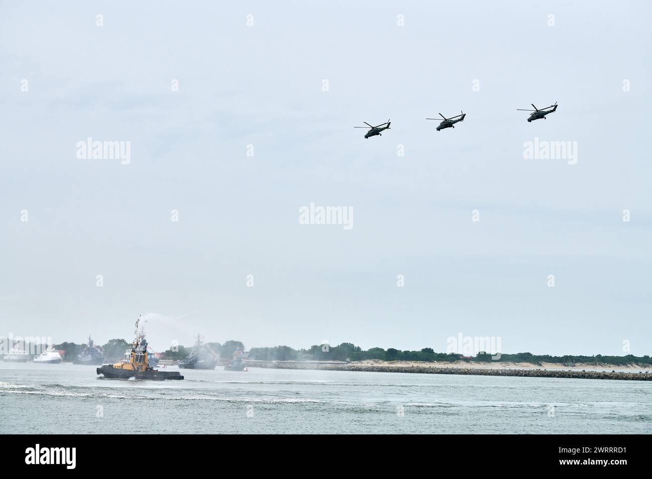Fireboat sailing along Russian naval forces parade warships with ...