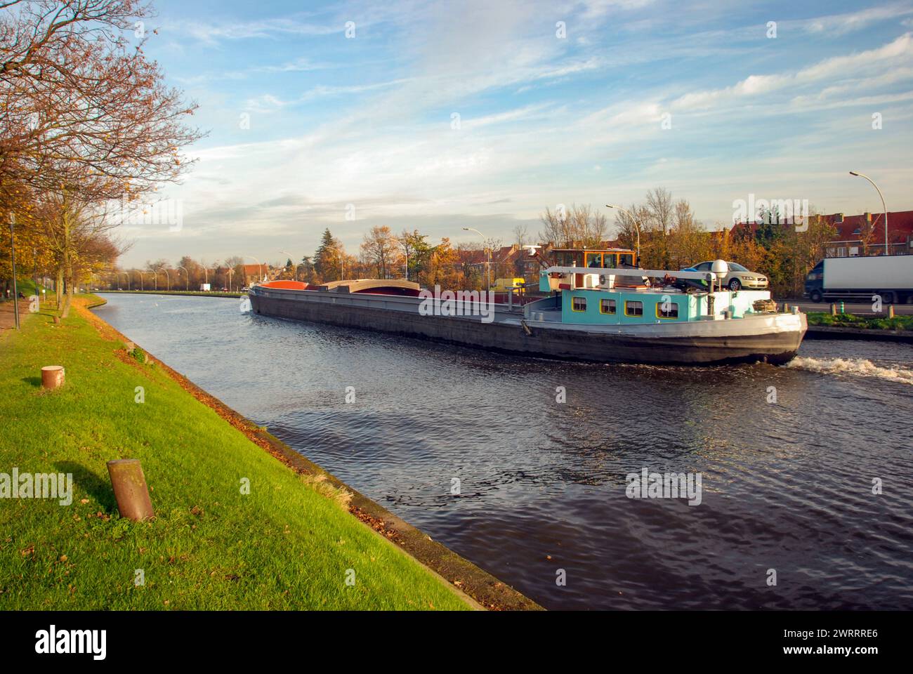 Barge on a canal Stock Photo - Alamy