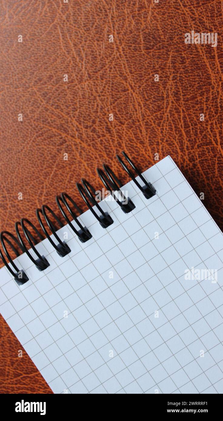 Spiral Pad With Clean Page On Brown Leather Concept Photo For Vertical ...