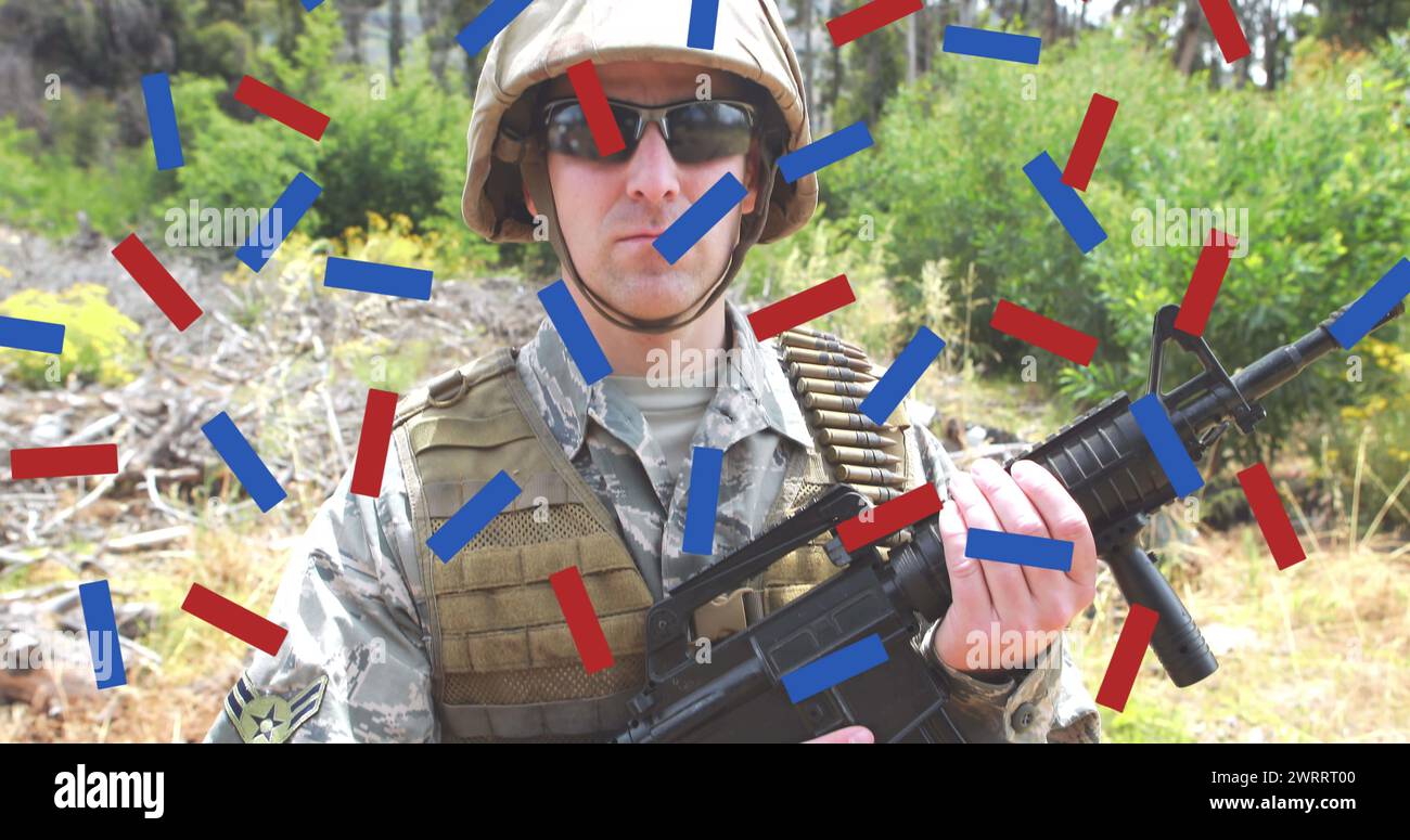 Composition of red and blue confetti, over male soldier in forest ...