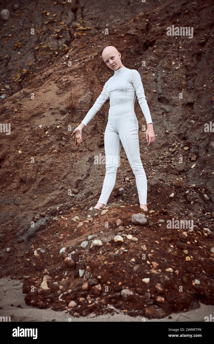 Full length portrait of young hairless girl with alopecia in white ...