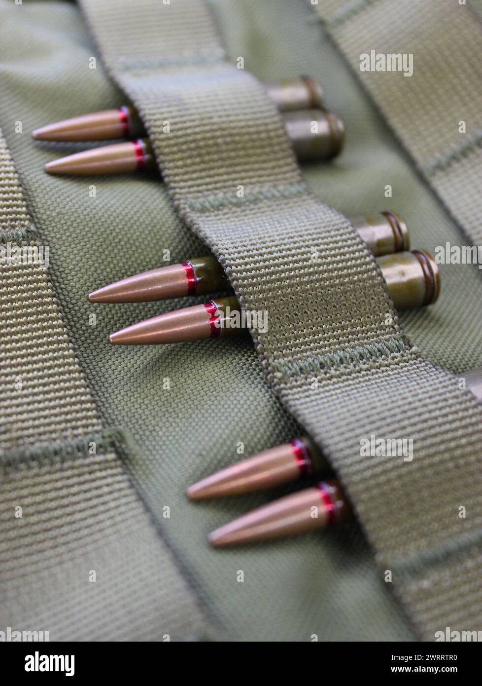 Pairs Of Ammunition Under Threaded Belts Of Unloading Vest Closeup ...