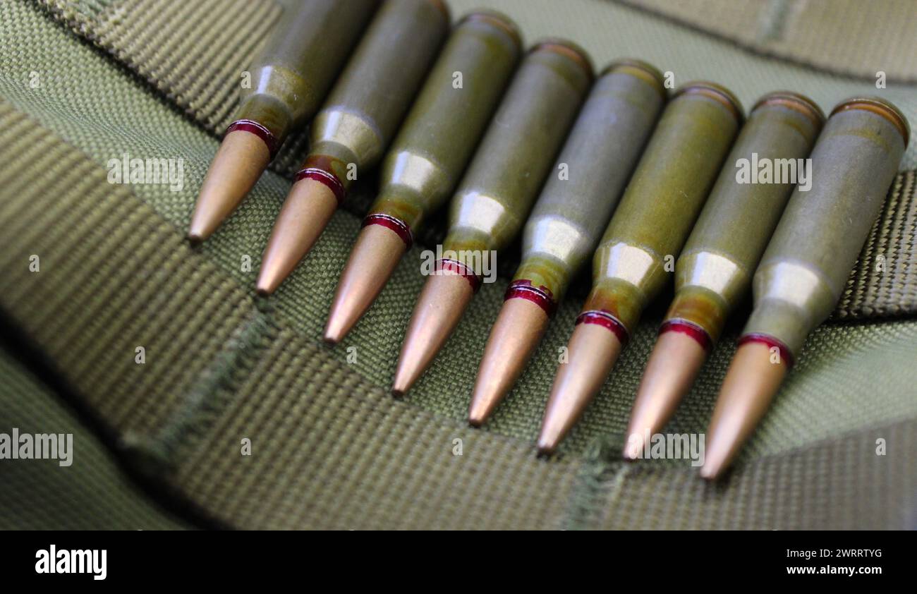 Ammunition in line on the bottom of a military helmet closeup view ...