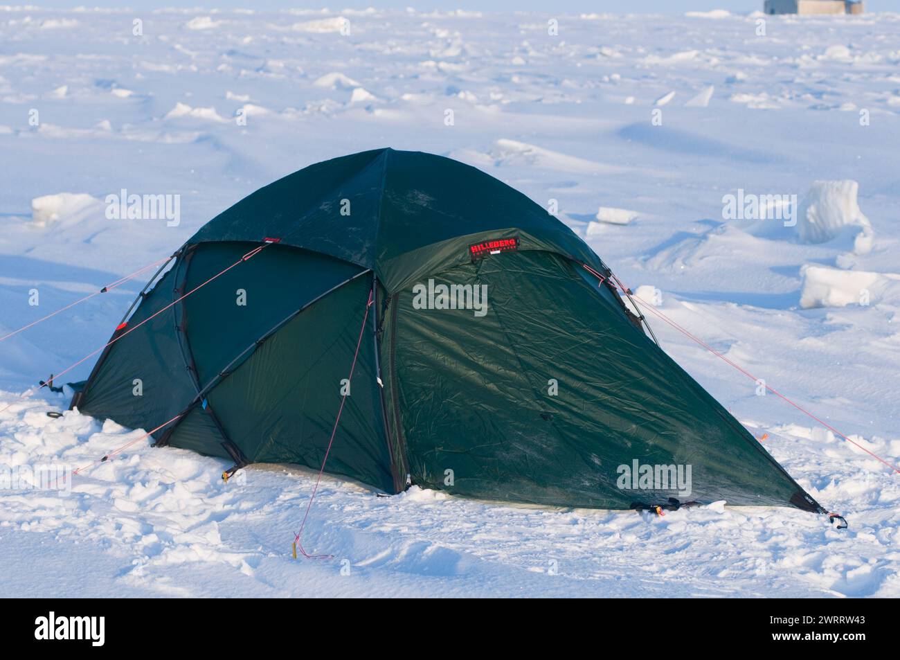 Photographer Steven Kazlowski with camera tripod and Hilleberg tent ...