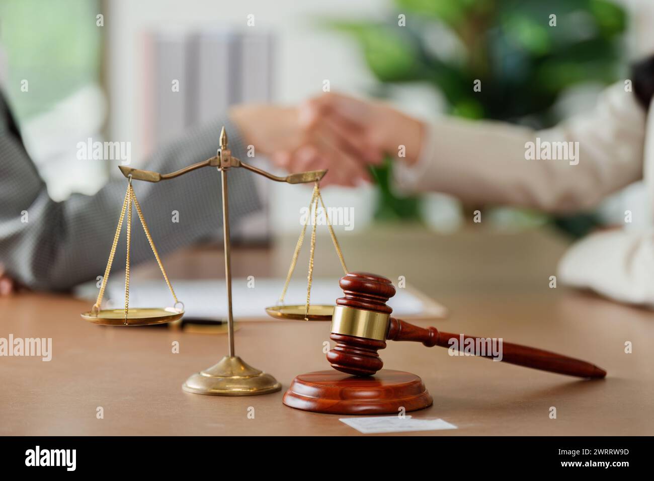 Scales of justice in hands hi-res stock photography and images - Alamy