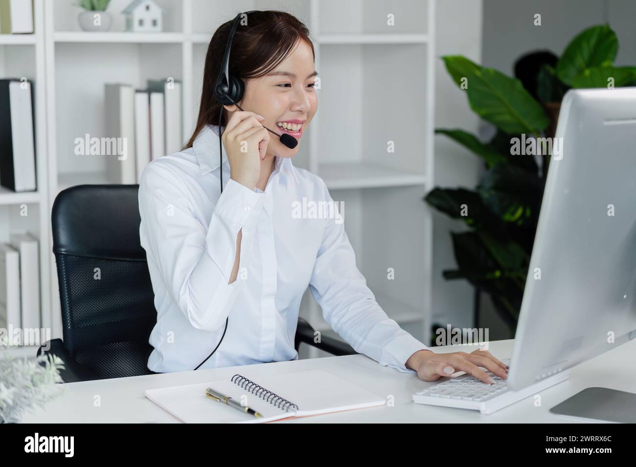 Customer service, woman and happy call center agent giving advice ...