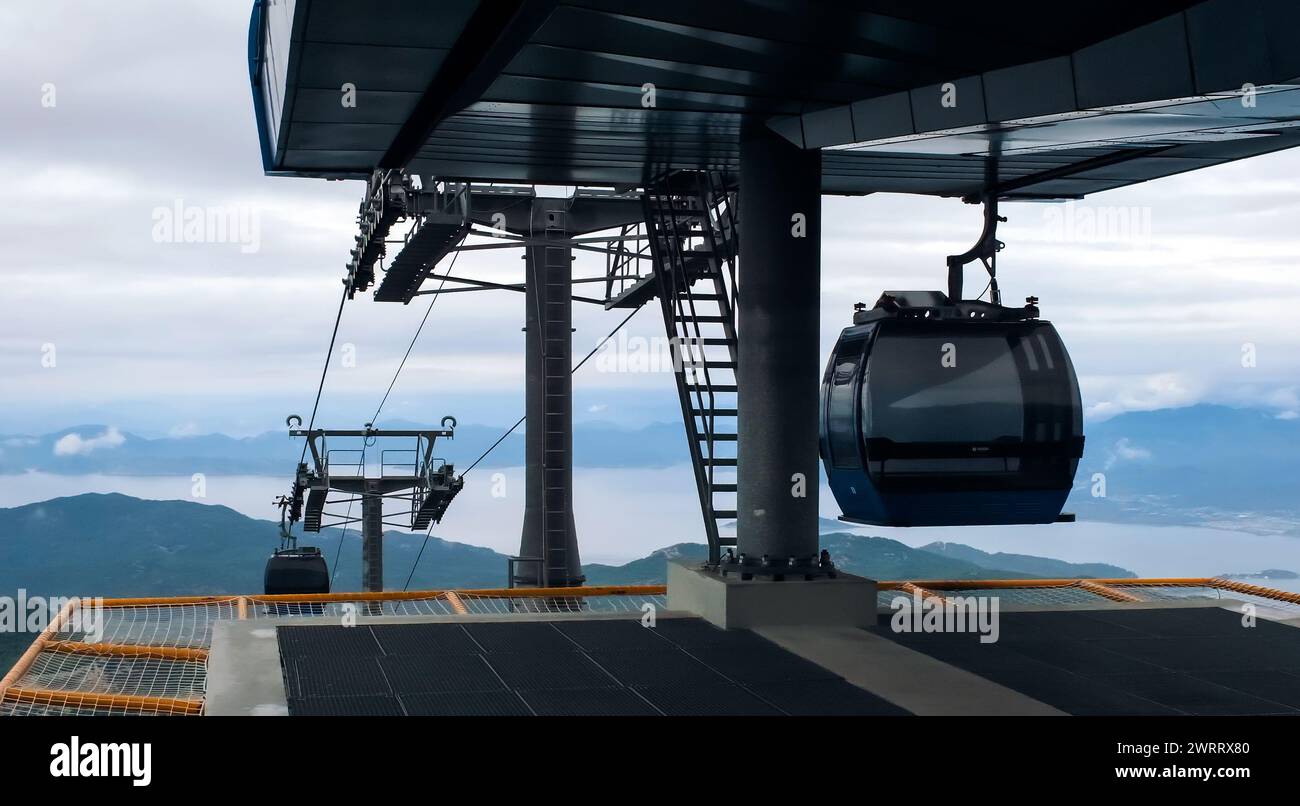 Ropeway, cable car cabins against seascape in Oludeniz, Turkey. Tourism ...