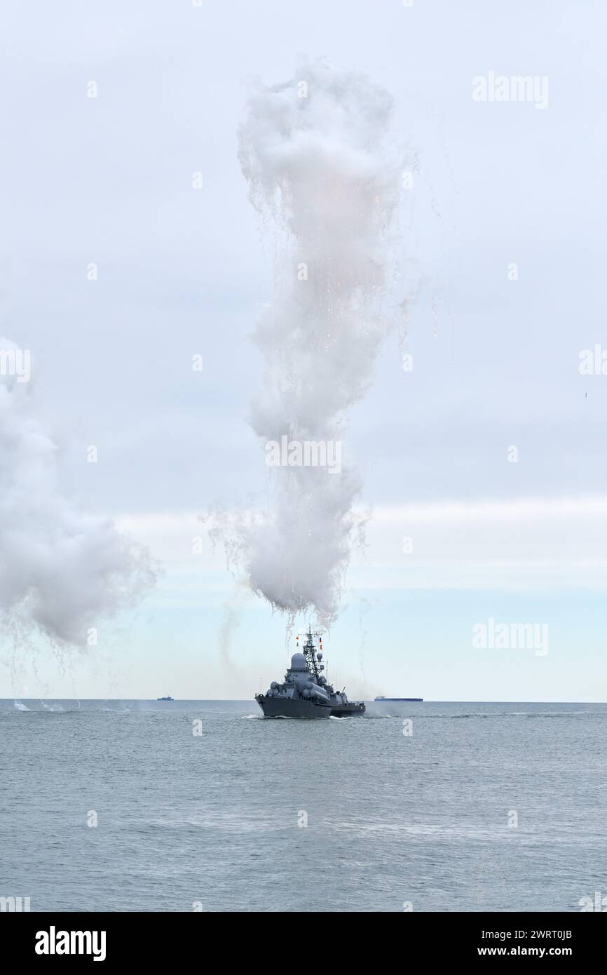 Russian warship fired decoy flares for self defense, sailing at sea ...