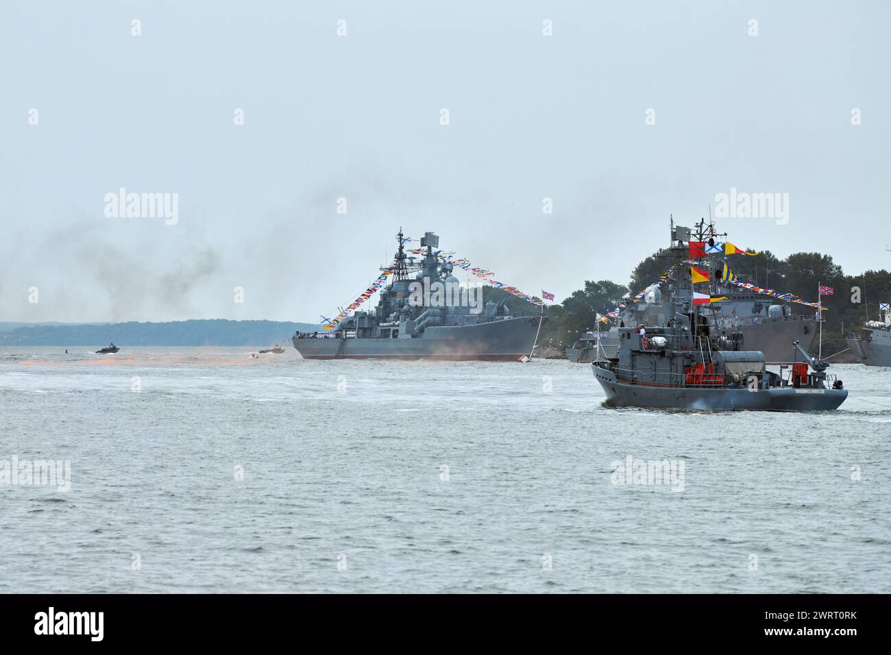 Military parade of Russian naval forces warships along coastline ...