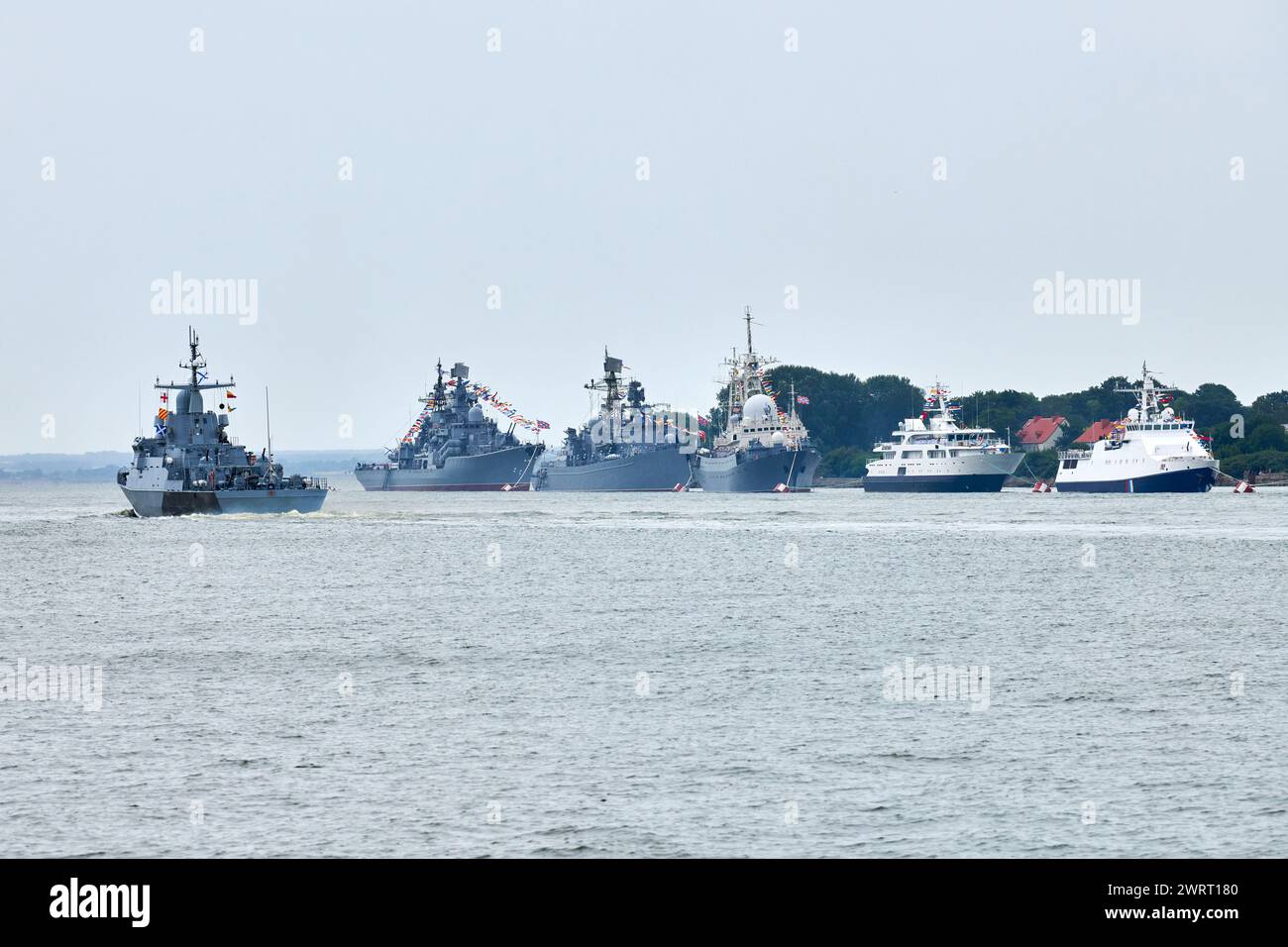 Military parade of Russian naval forces warships along coastline ...