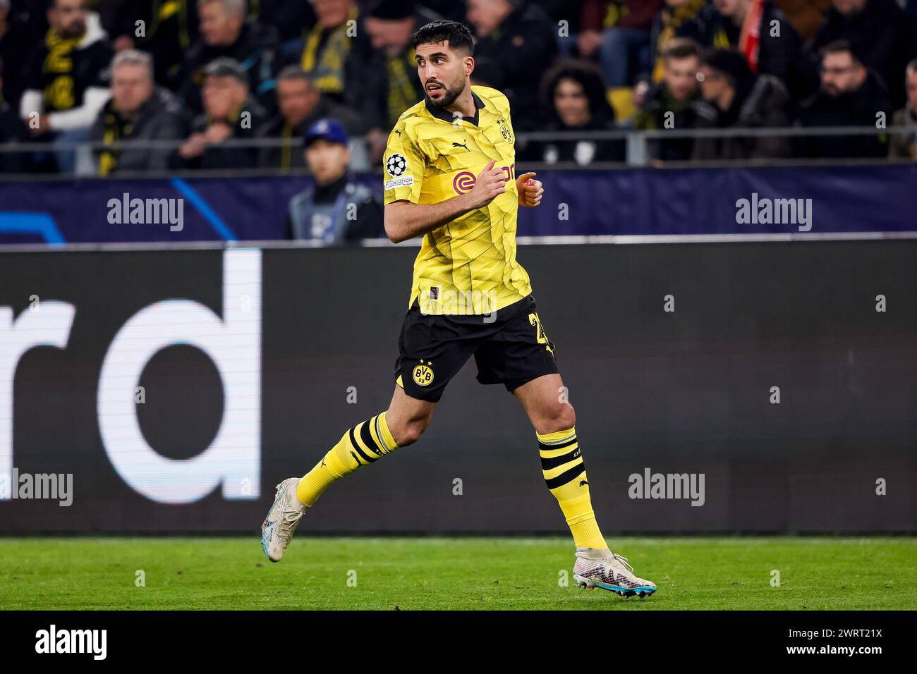 DORTMUND , GERMANY - MARCH 13: Emre Can (Borussia Dortmund) looks on ...