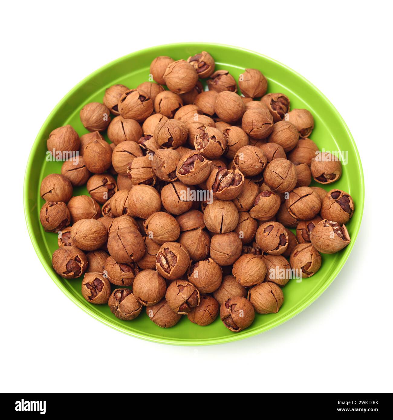 shagbark hickory nuts on white background Stock Photo - Alamy
