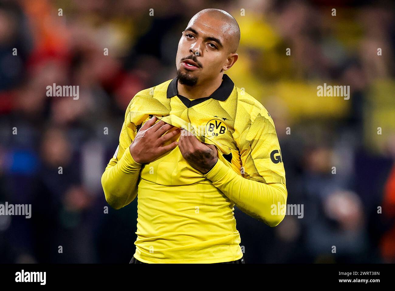 DORTMUND , GERMANY - MARCH 13: Donyell Malen (Borussia Dortmund) looks ...