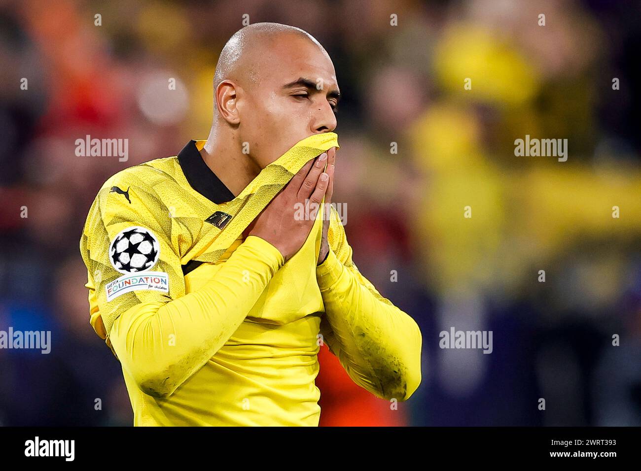 DORTMUND , GERMANY - MARCH 13: Donyell Malen (Borussia Dortmund) looks ...