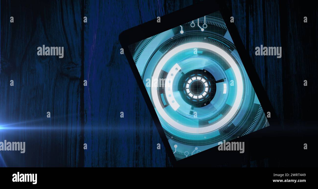 Image of blue circular scanner and processing data on screen of tablet ...