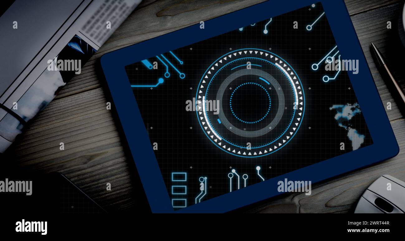 Image of motherboard and circular scanner processing data on screen of ...