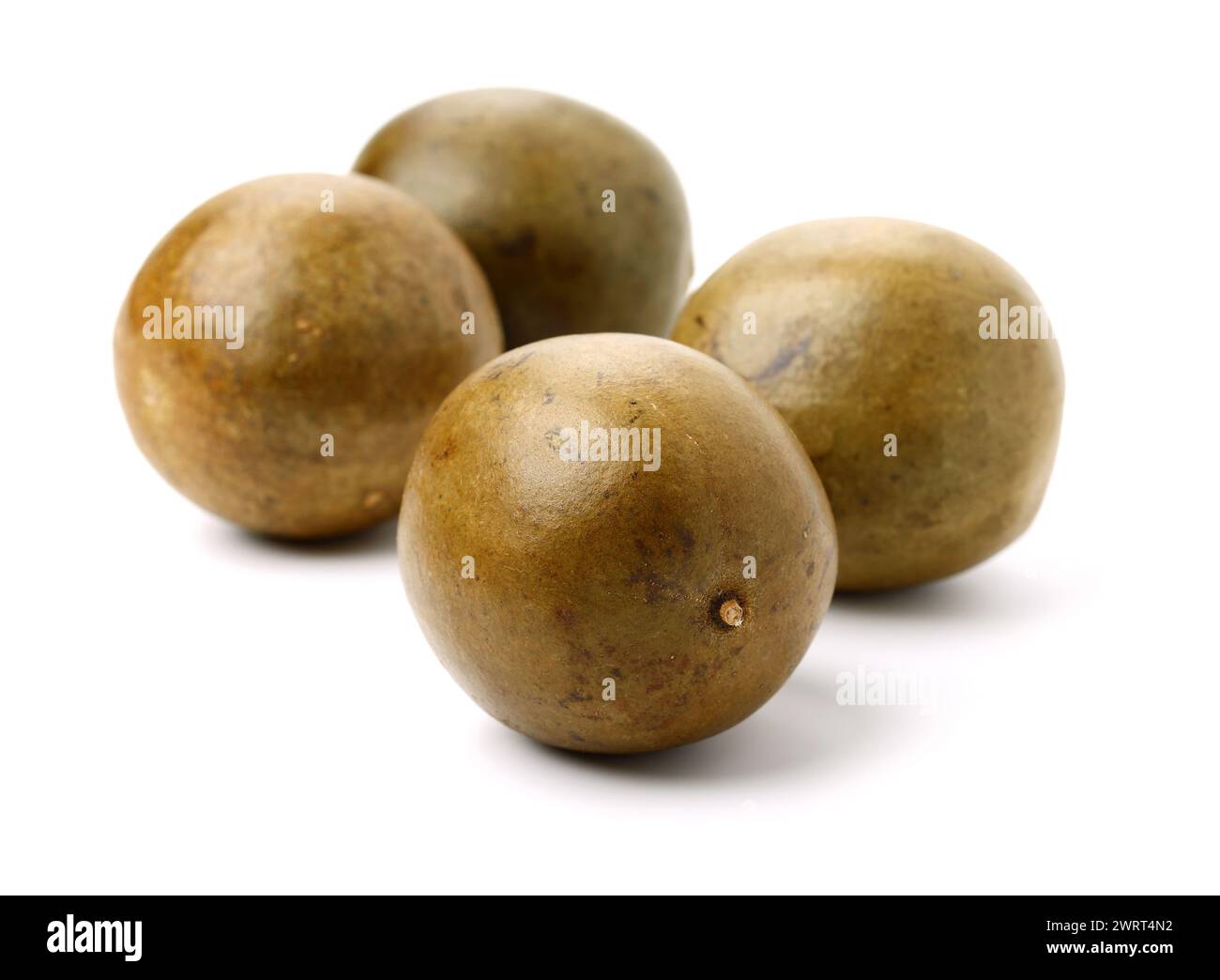 Golden Luo Han Guo on white background Stock Photo - Alamy