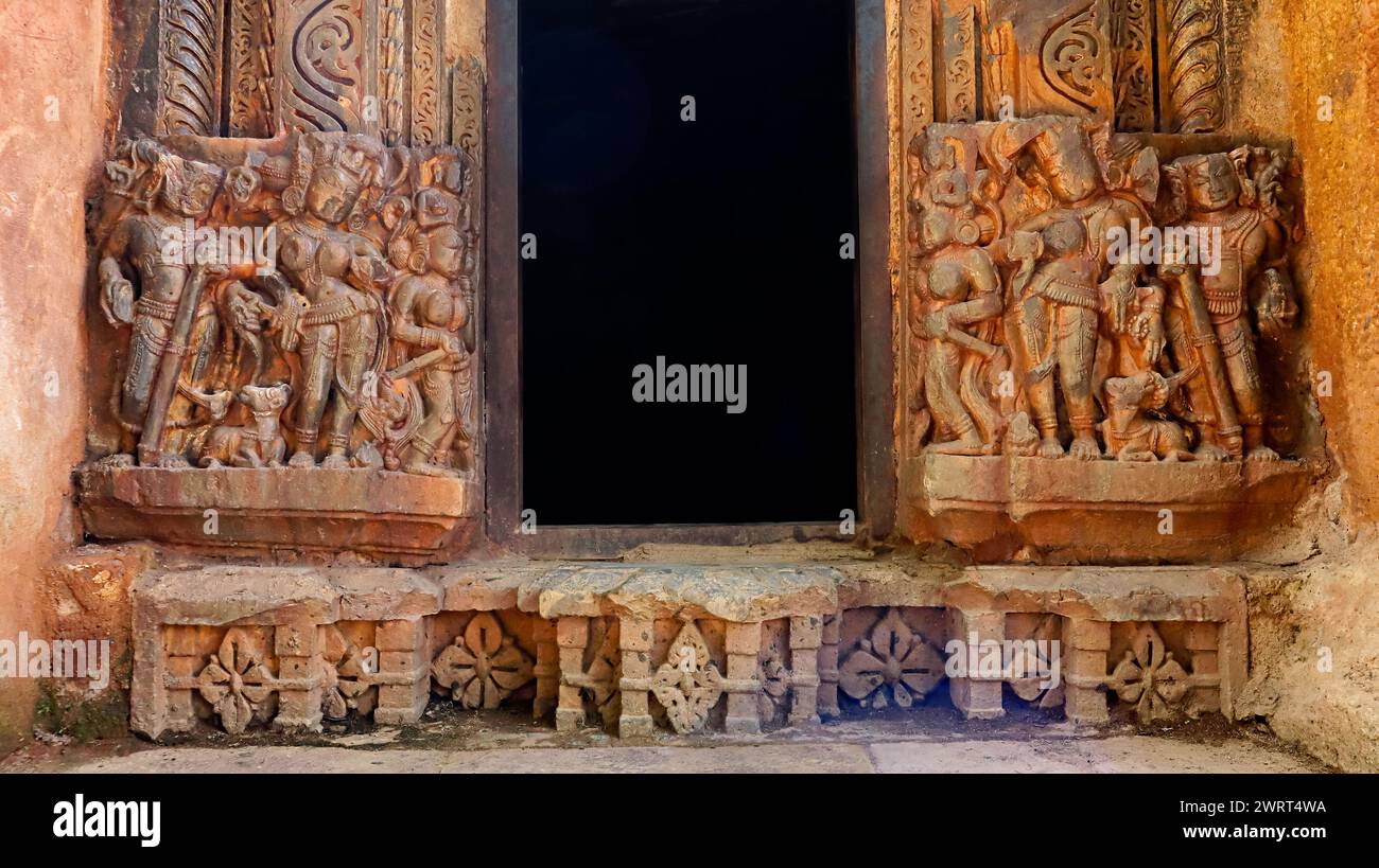 Carvings of dwarapala and flower panel on shrine door entrance, Cherki ...
