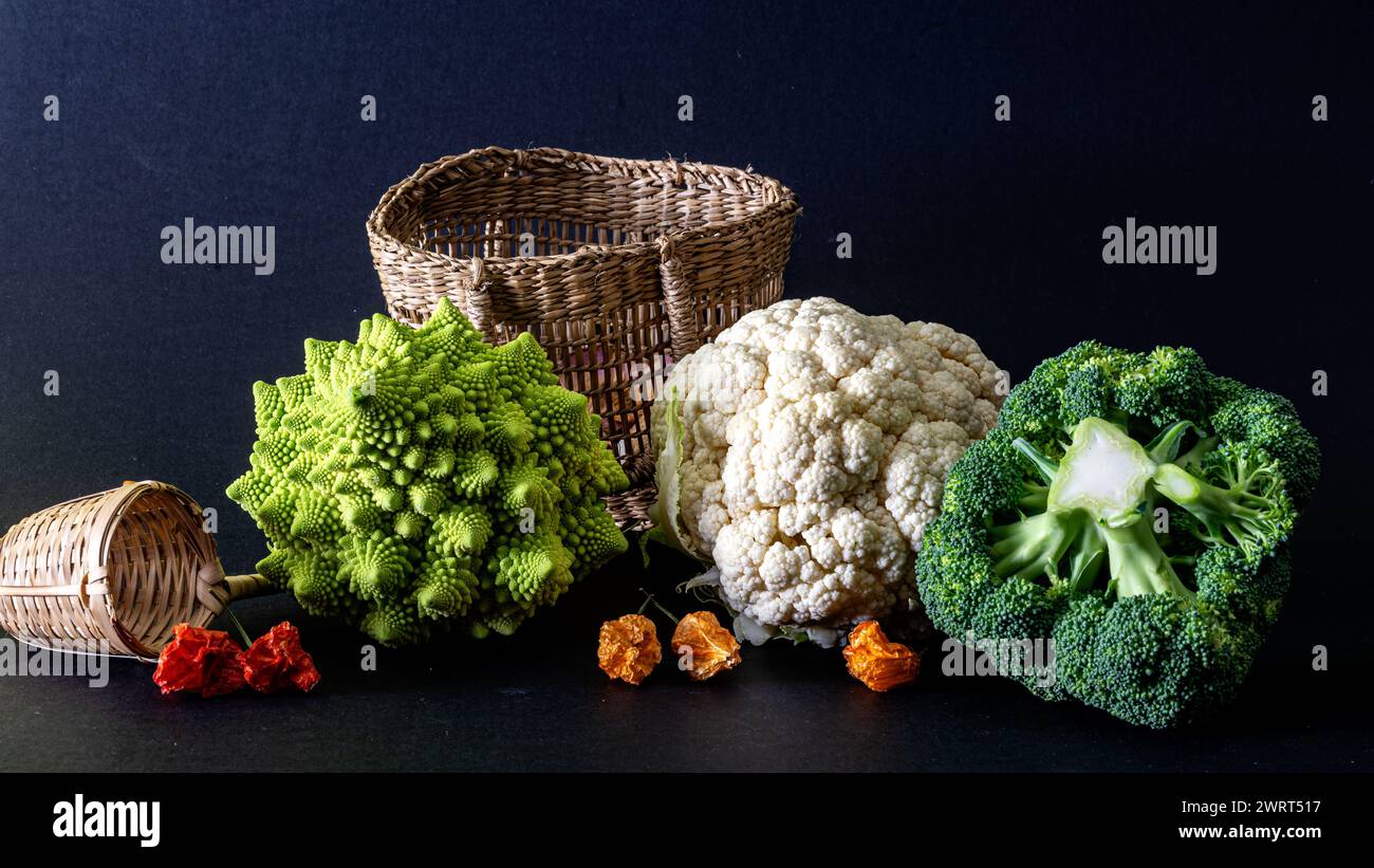 still life photo with photo of cauliflower, different colors and ...
