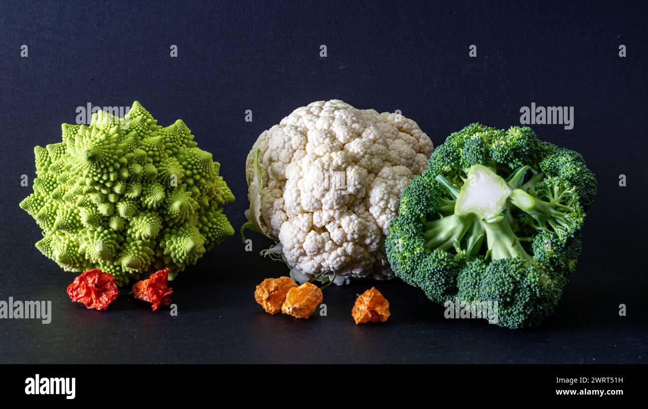 still life photo with photo of cauliflower, different colors and ...