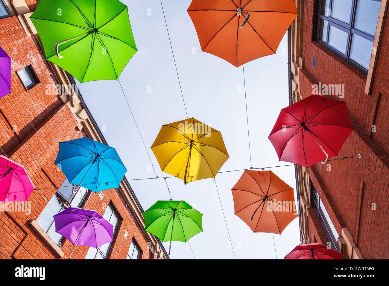 A colourful display of umbrellas hanging overhead in the Prince Bishops ...