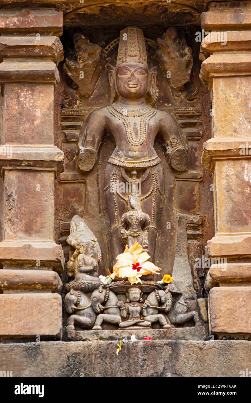 Bhadra niches in the west with Surya in the lower tier. Surya is shown ...