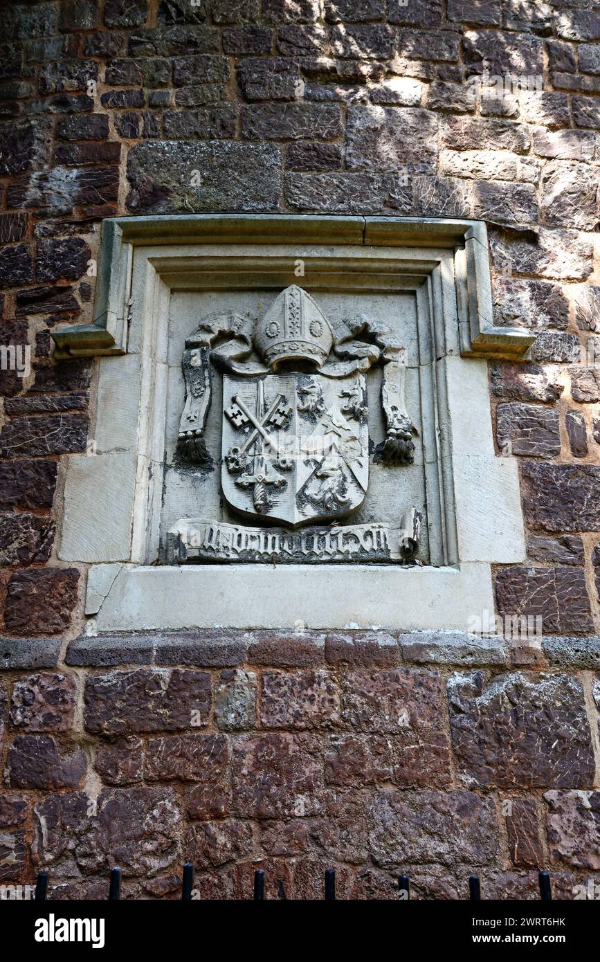 Coast of arms on the Roman city wall along Little Southernhay Lane ...