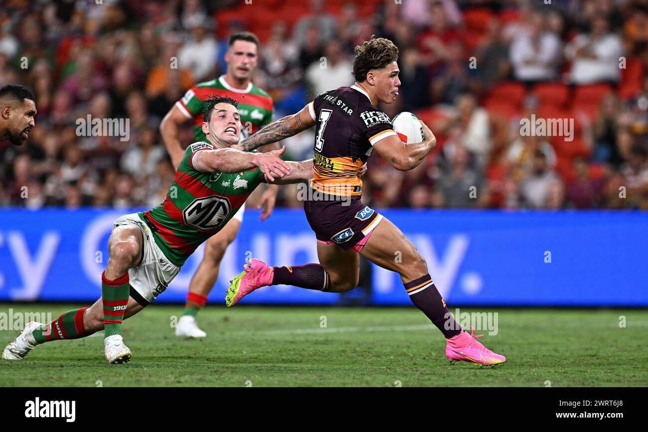 Brisbane, Australia. 14th Mar, 2024. Reece Walsh of the Broncos fends ...