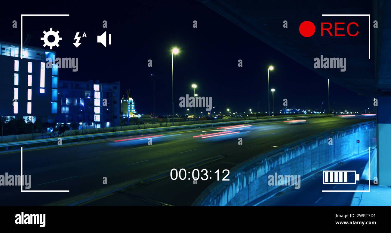 Image of night traffic in fast motion, seen on a screen of a digital ...