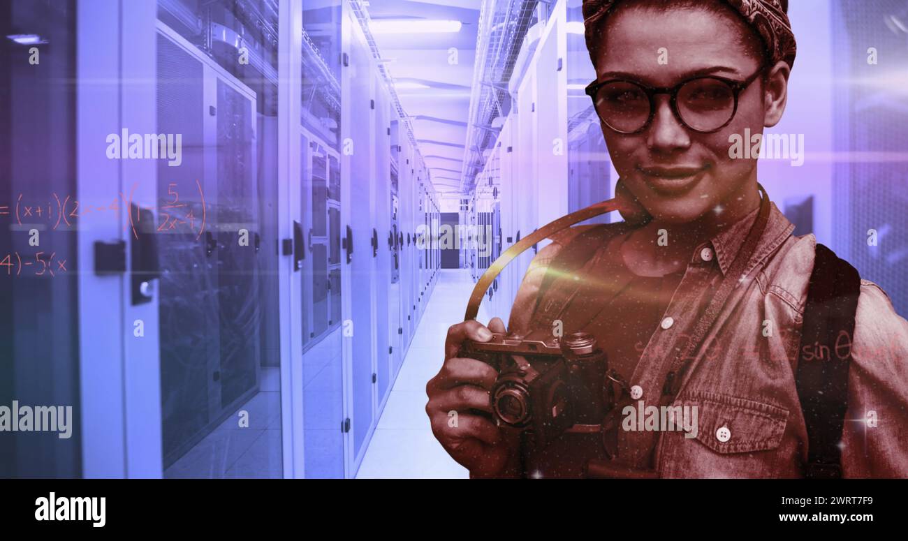 Digital composite of woman with camera in server room, symbolizing ...