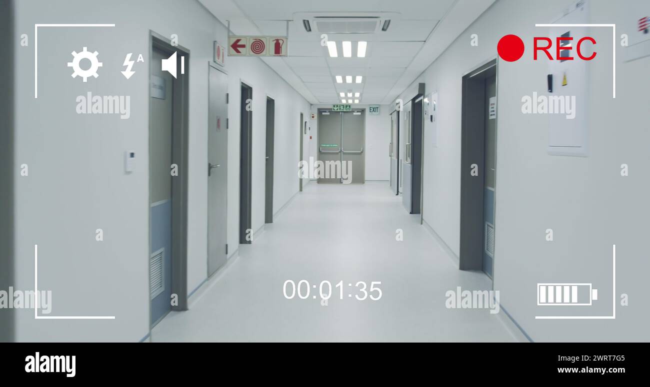 Digital camera records a hospital corridor in 4k with on-screen icons ...