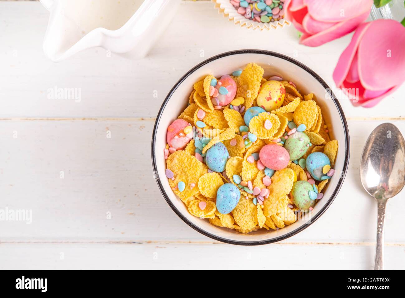 Easter breakfast cereals, corn flakes with Easter chocolate eggs and ...