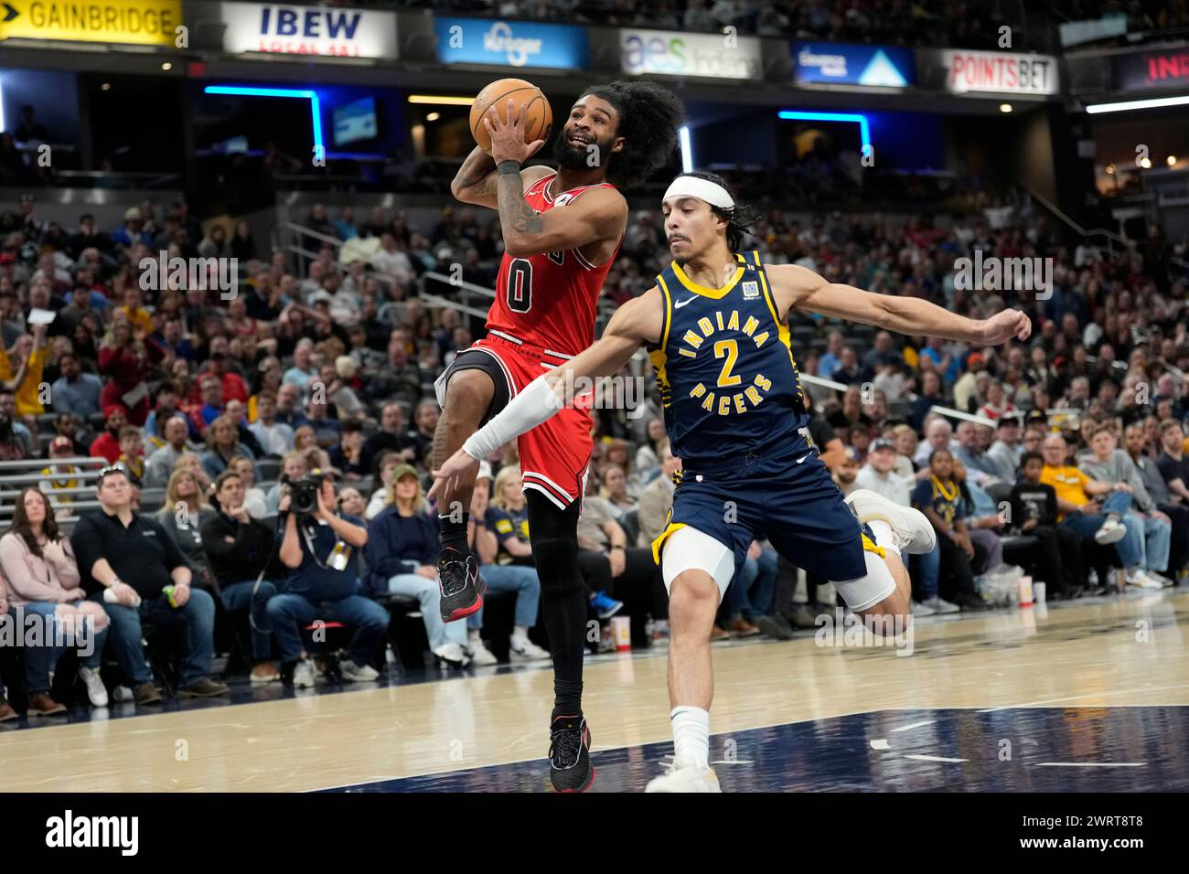 Chicago Bulls guard Coby White (0) in action during an NBA basketball ...