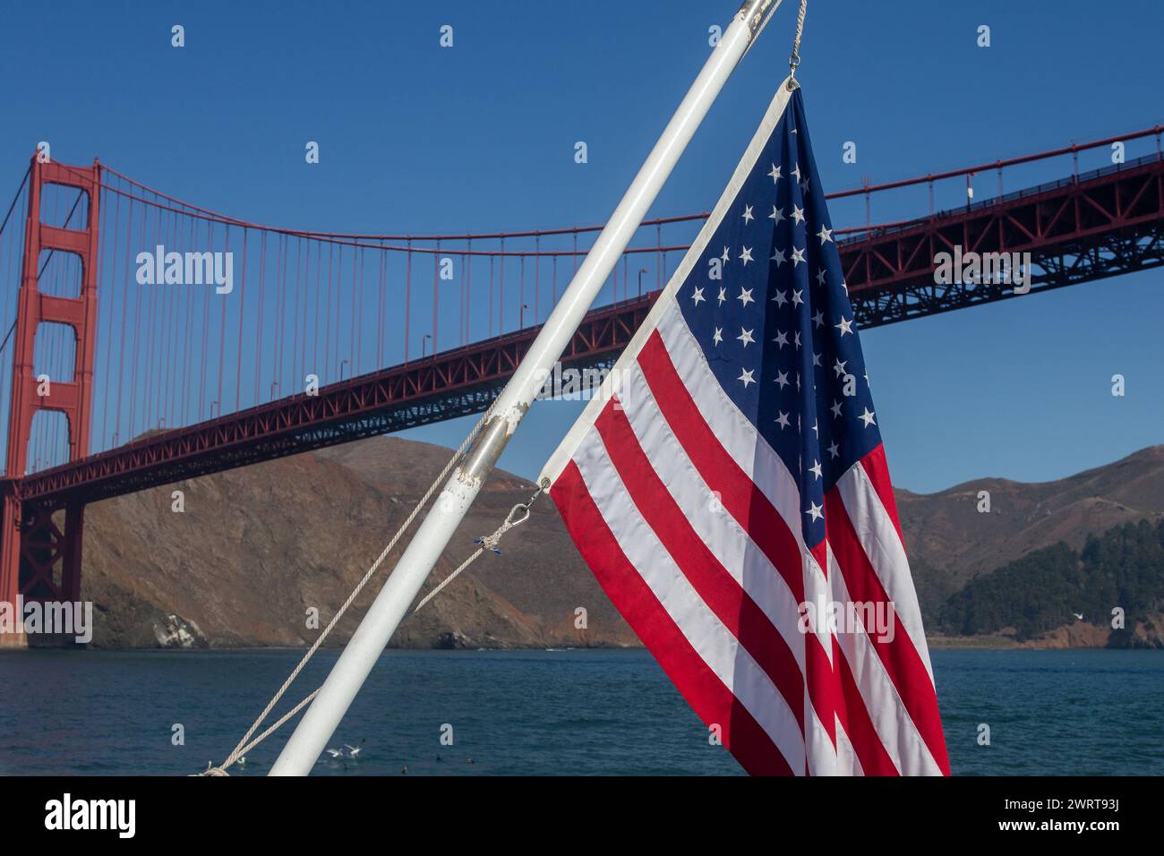US Flag and Golden Gate Bridge from a boat tour Stock Photo - Alamy