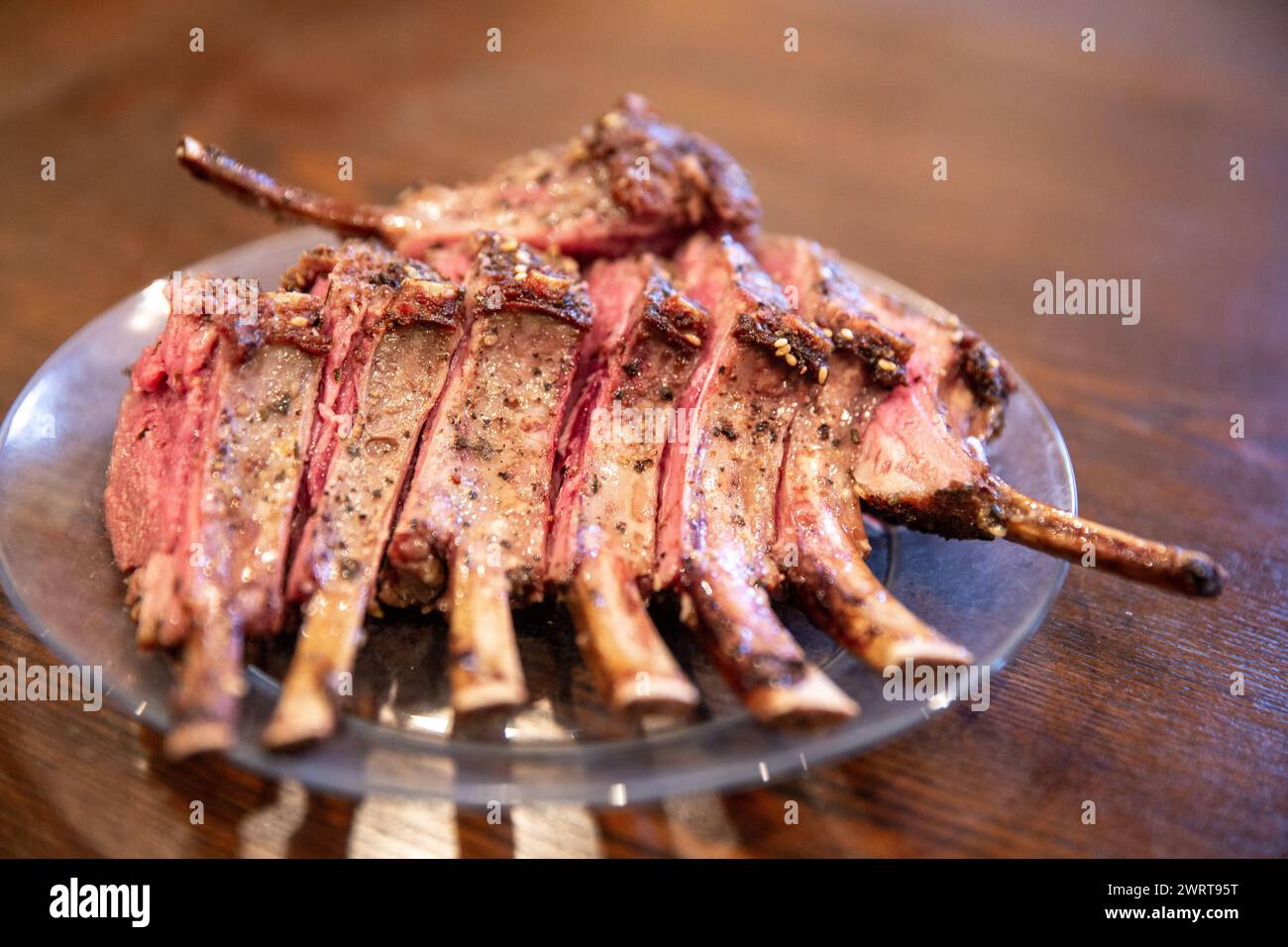 Medium Rare Lamb Rack with no sides yet Stock Photo - Alamy