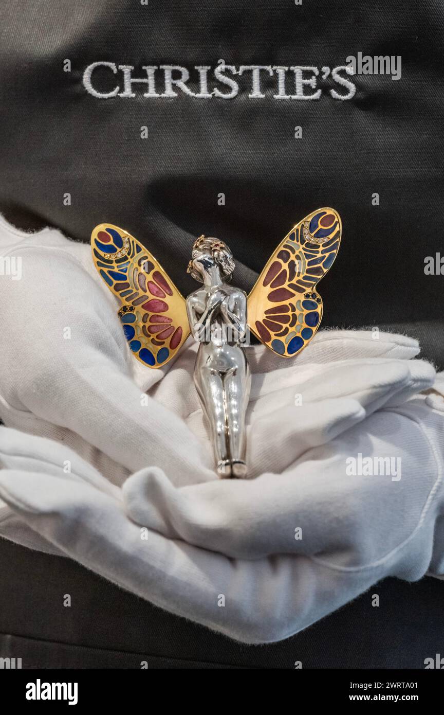 London, UK. 14th Mar, 2024. An enamelled silver and silver-gilt fairy ...