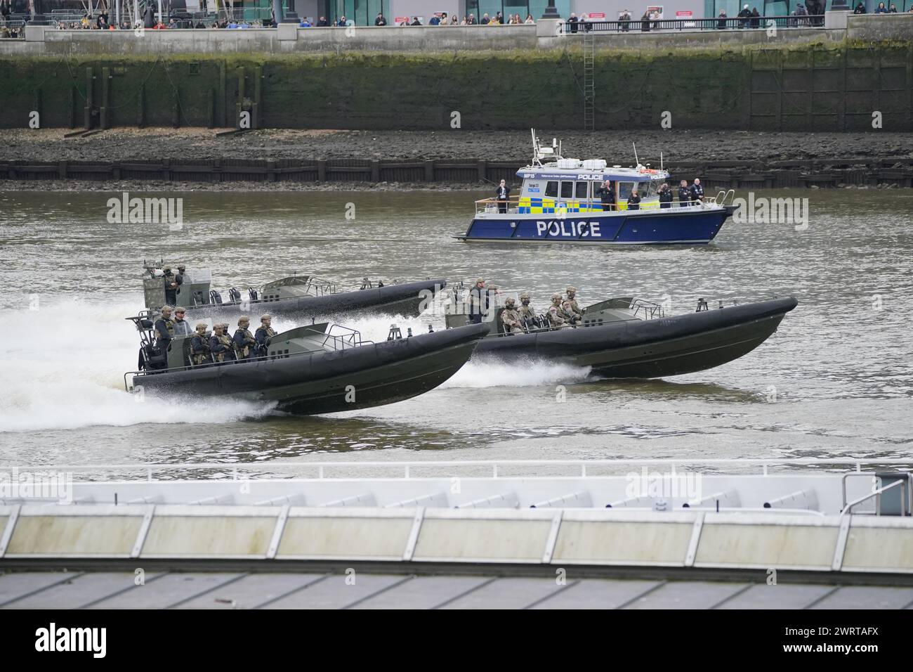 Royal Marine raiding craft bearing the Dues from HMS President, arrive ...