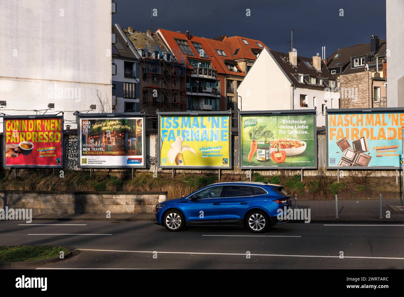 billboards on Maximinen street near main station, Cologne, Germany. Werbeplakate an der ...